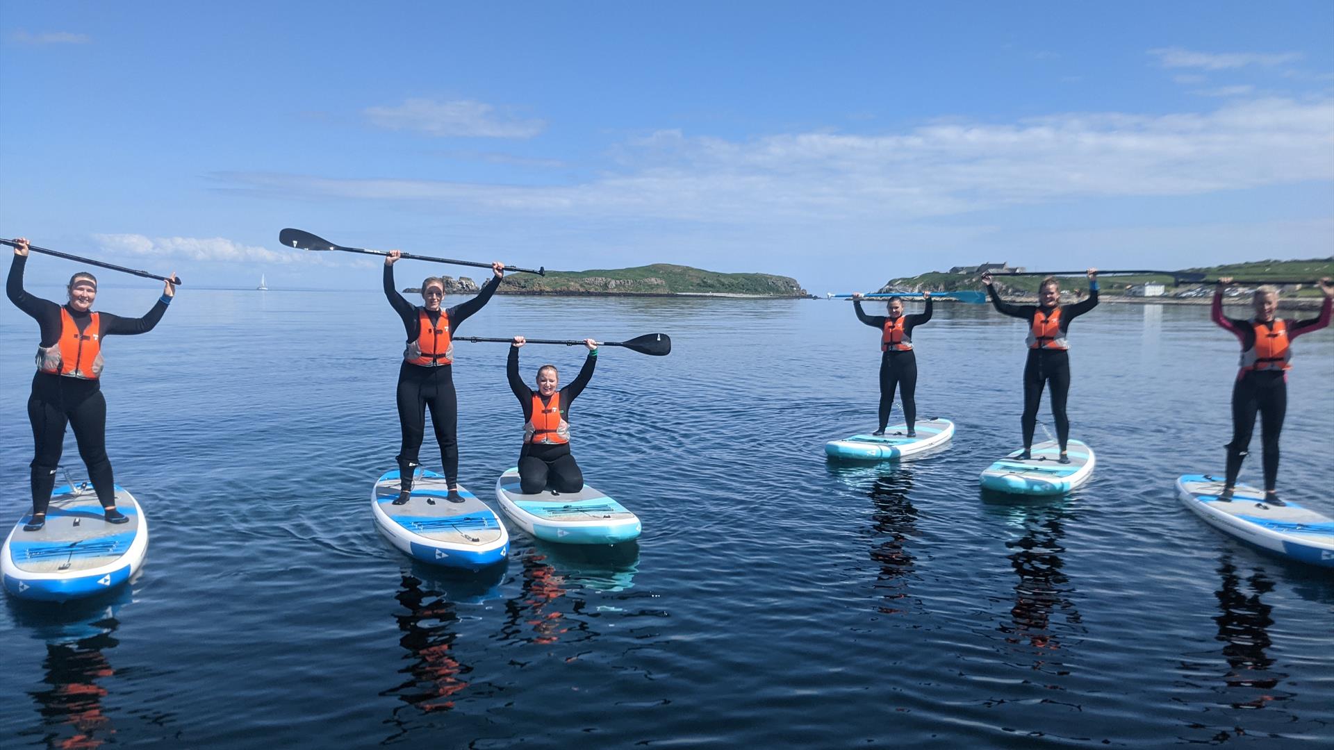 Stand up paddle boarding- Island Magee SUP - Ballygally Holiday Apartments